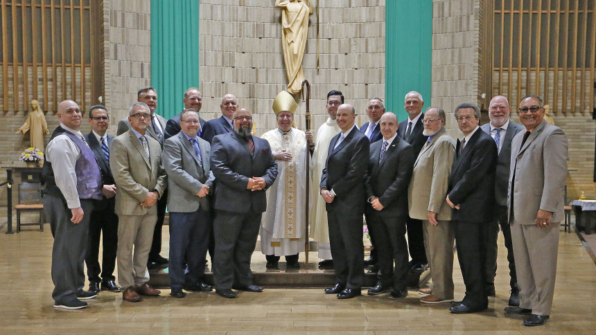 Bishop McClory confirms 16 diaconate candidates into ministry of lector ...